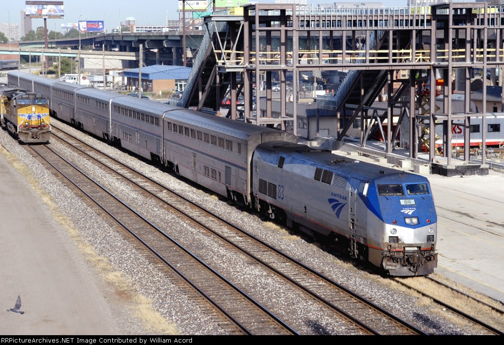 Amtrak Texas Eagle and Union Pacific coal train at Amtrak station